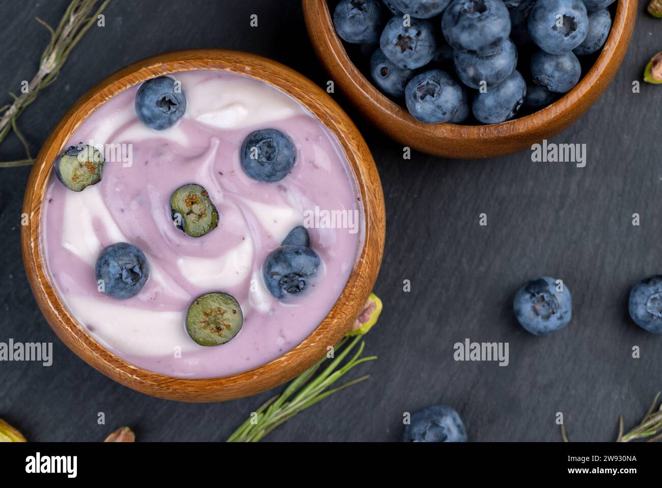 fresh purple and white yogurt with blueberries and blueberry berry ...