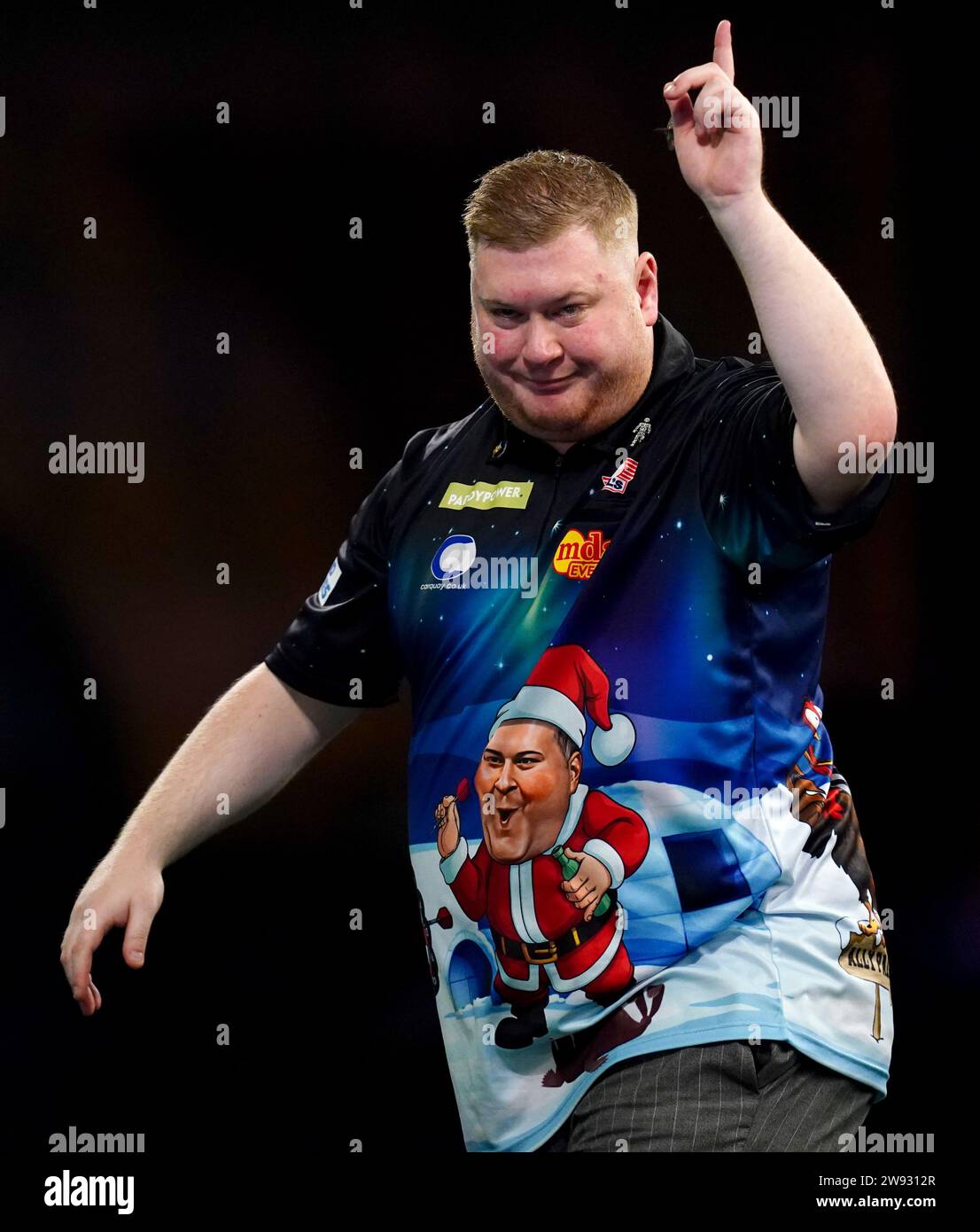 Ricky Evans celebrates his victory over Nathan Aspinall on day nine of ...