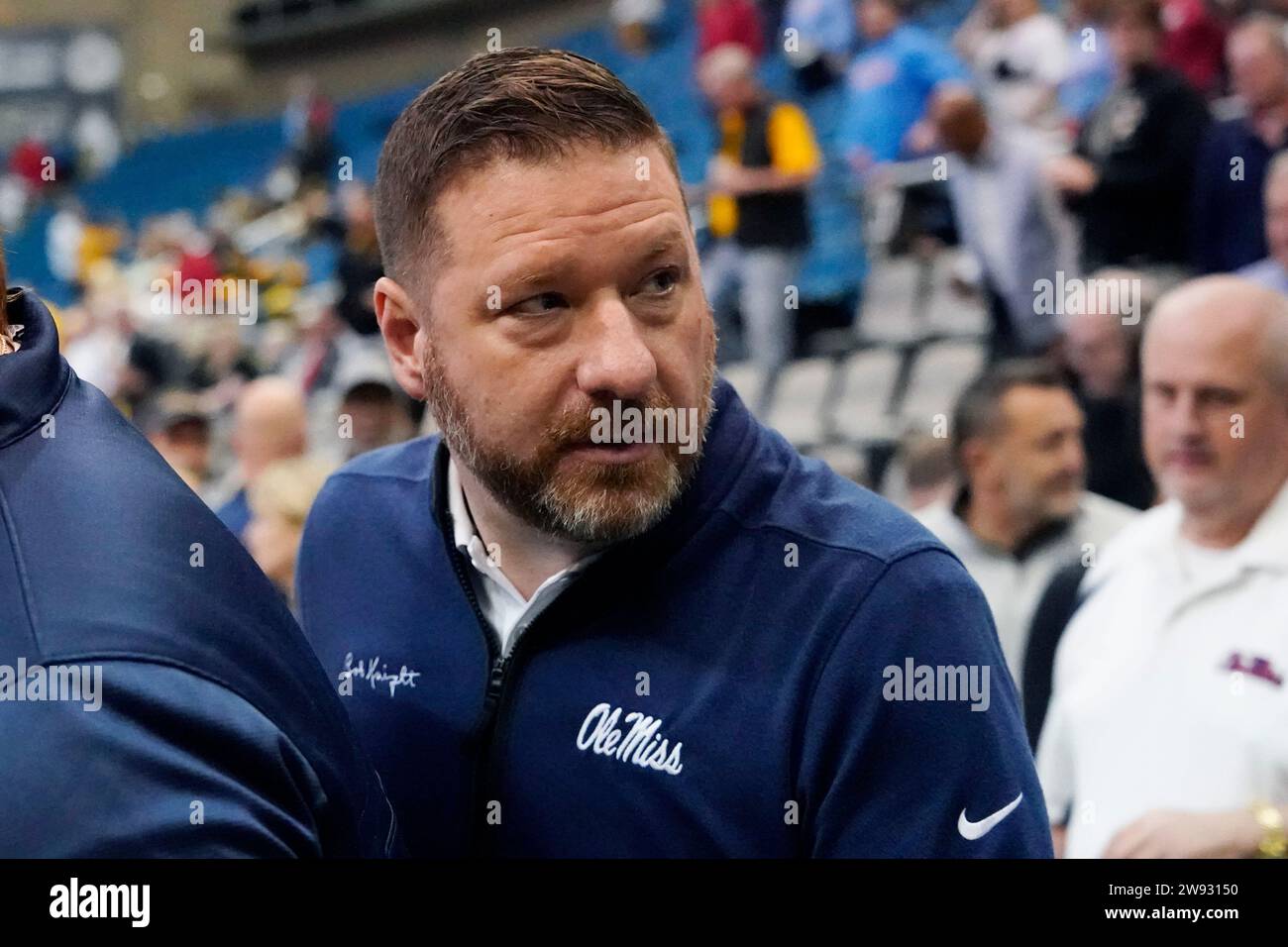 Mississippi head coach Chris Beard looks down court following an NCAA college basketball game ...