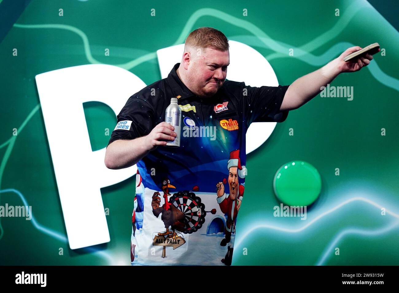 Ricky Evans celebrates his victory over Nathan Aspinall on day nine of ...