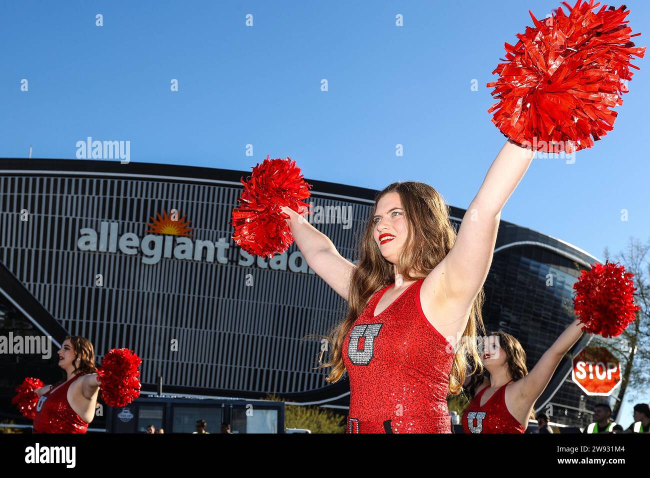 Las Vegas, NV, USA. 23rd Dec, 2023. A member of the Utah Utes cheer ...