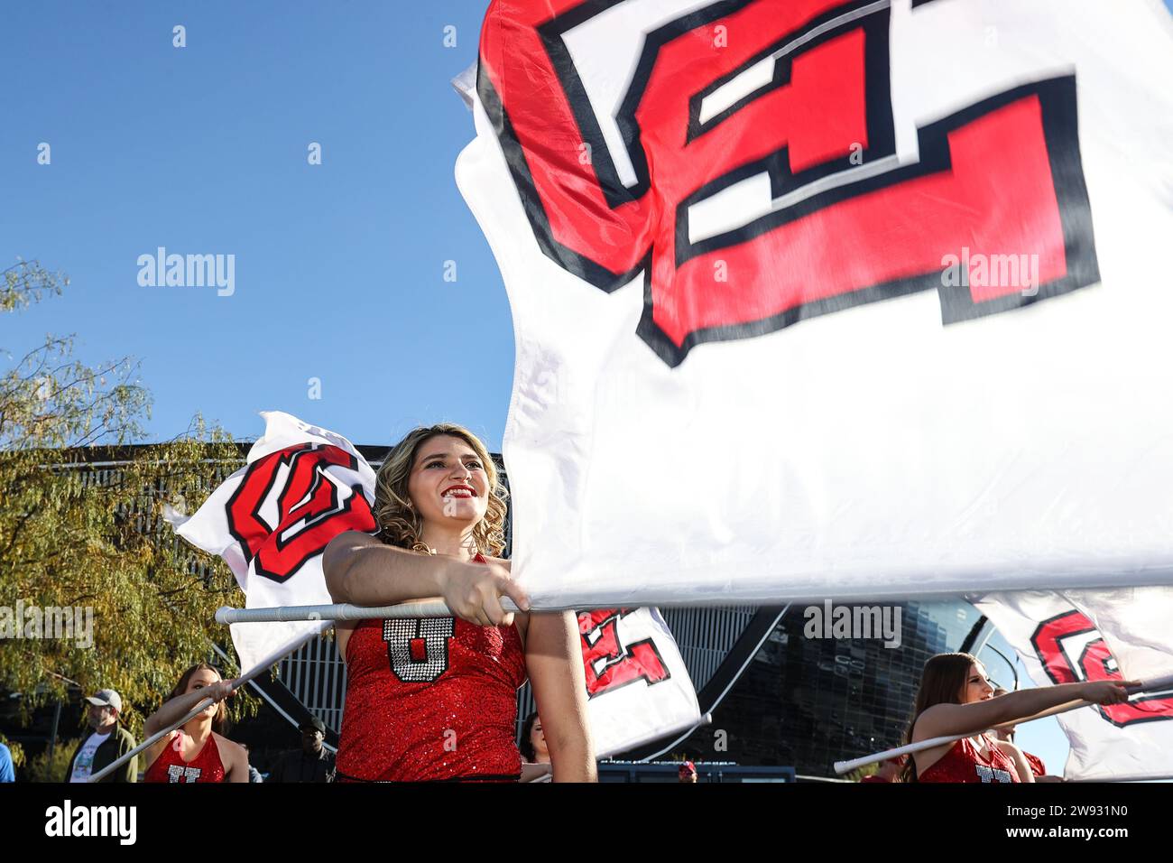 Las Vegas, NV, USA. 23rd Dec, 2023. A member of the Utah Utes flag team ...