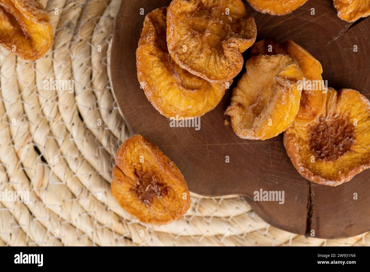 oriental dried fruits unwashed and unpeeled, dried peach before washing ...