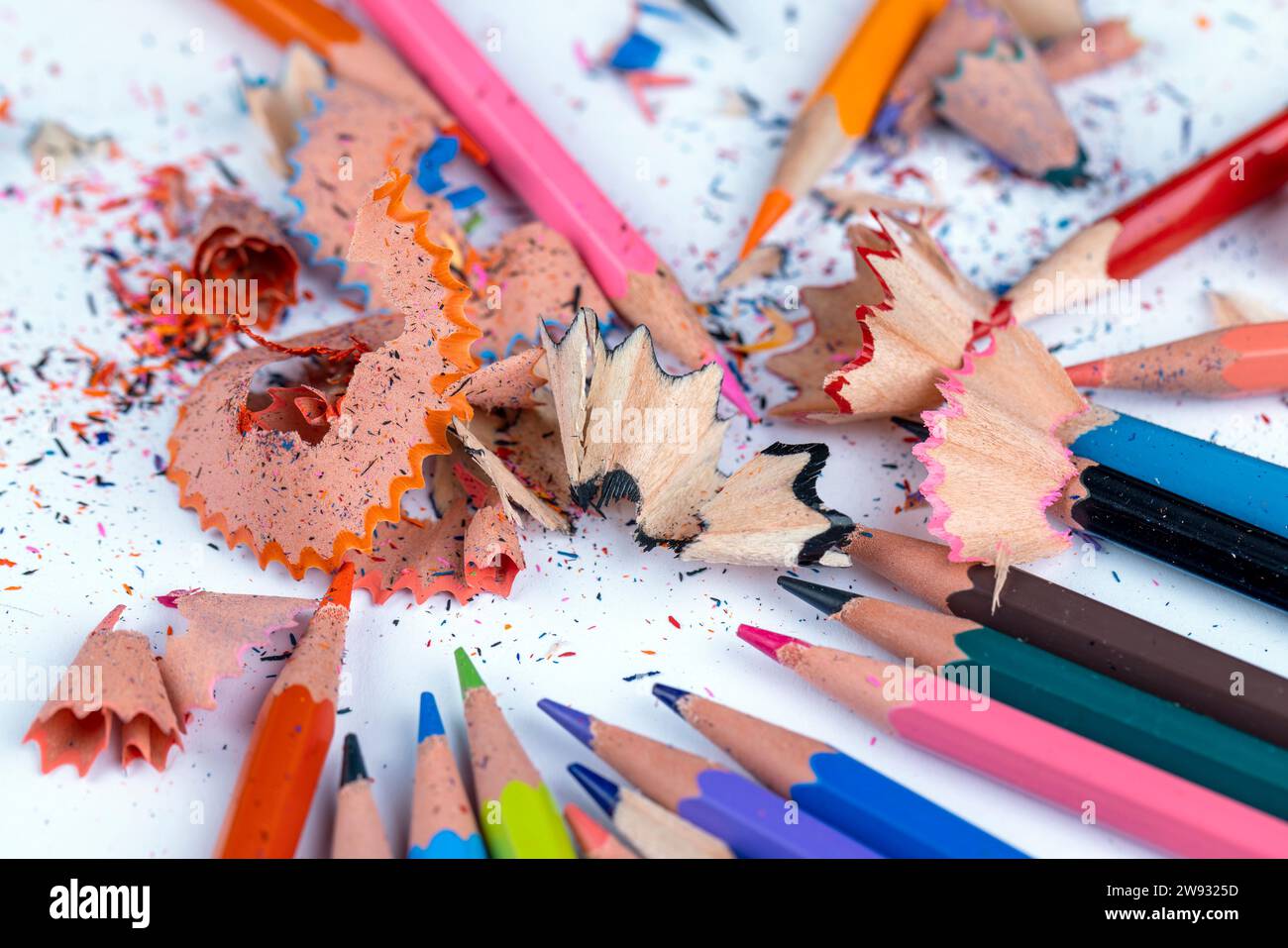 sharp pencil of different colors on paper close-up , school supplies ...