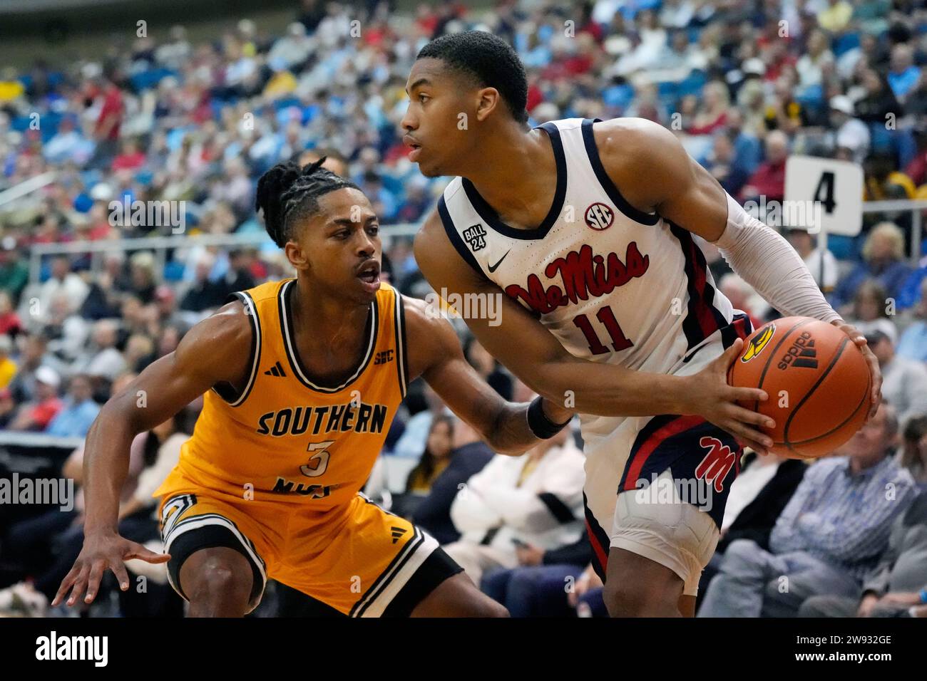 Mississippi guard Matthew Murrell (11) looks for an open teammate while ...