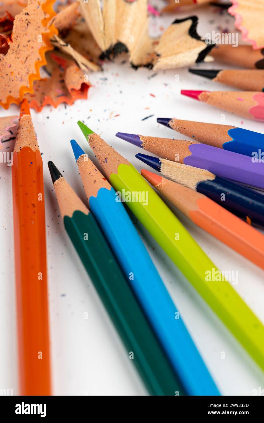sharp pencil of different colors on paper close-up , school supplies ...