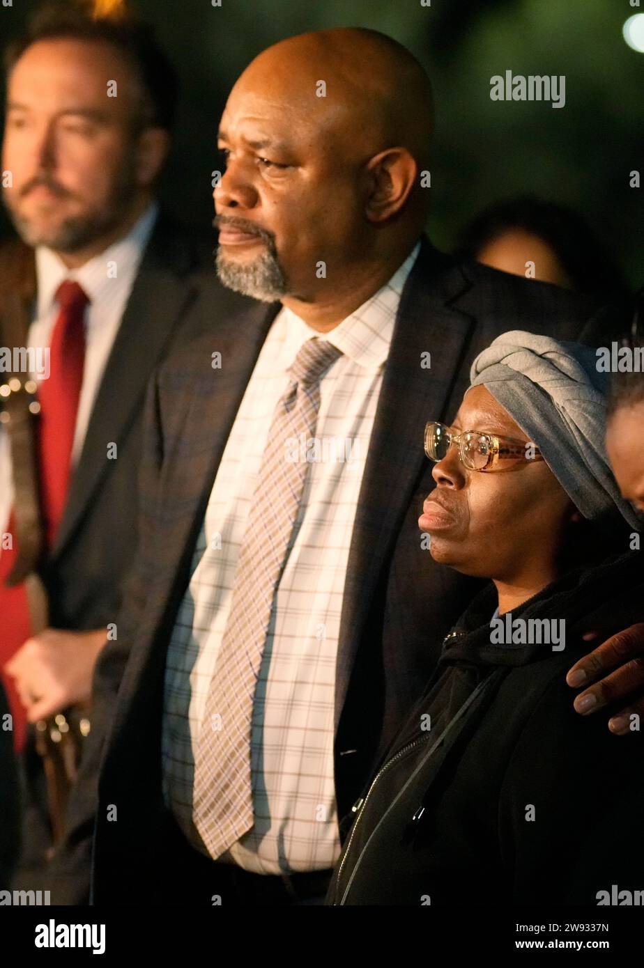 Sheneen McClain is consoled by Omar Montgomery outside the Adams County ...
