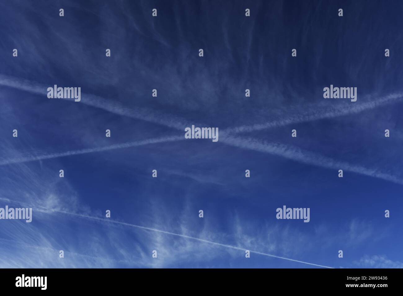 A skyscape with several traces of aviation Stock Photo - Alamy