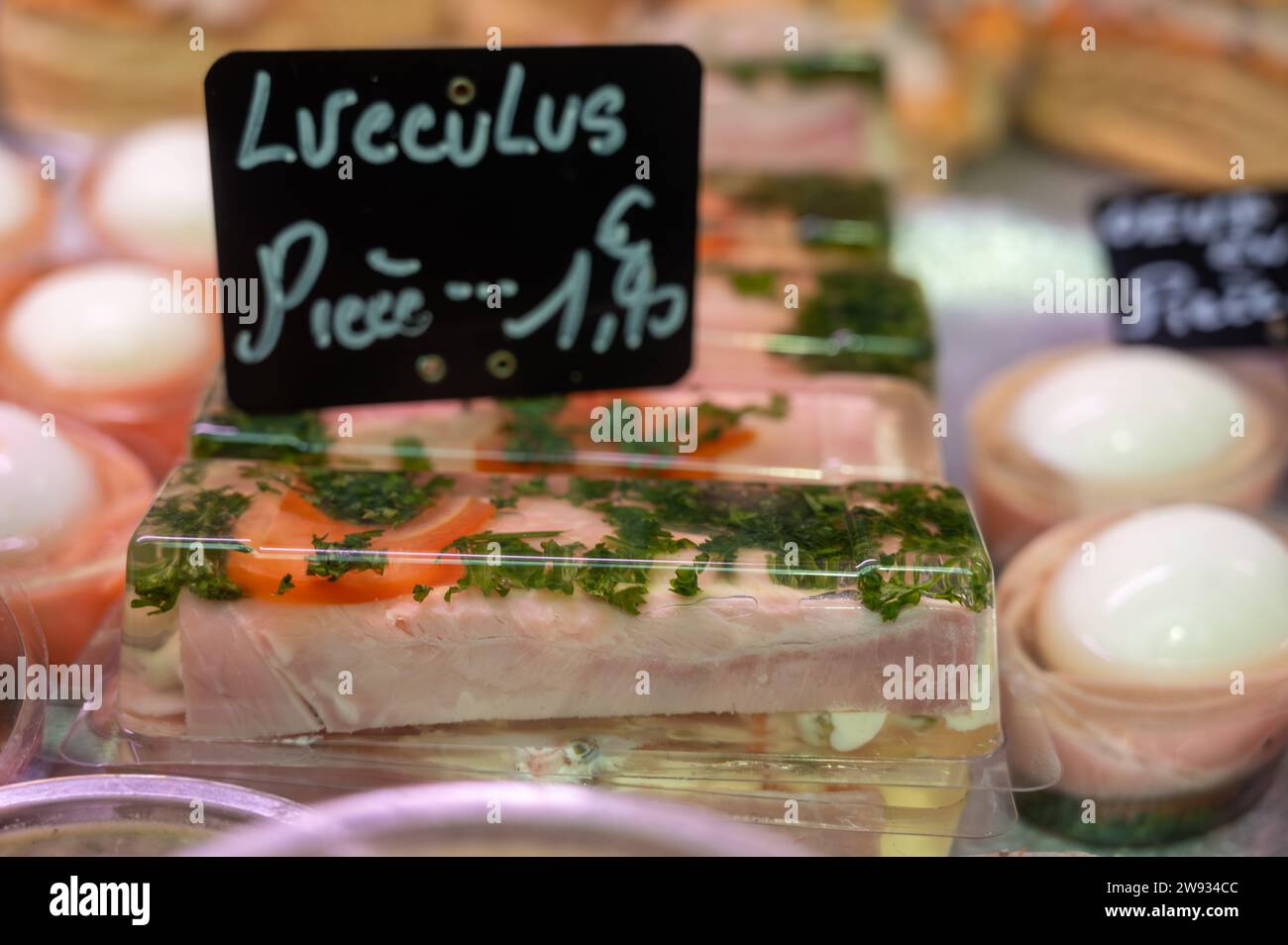 Assortment of meat on weekly food market in France, English translation ...