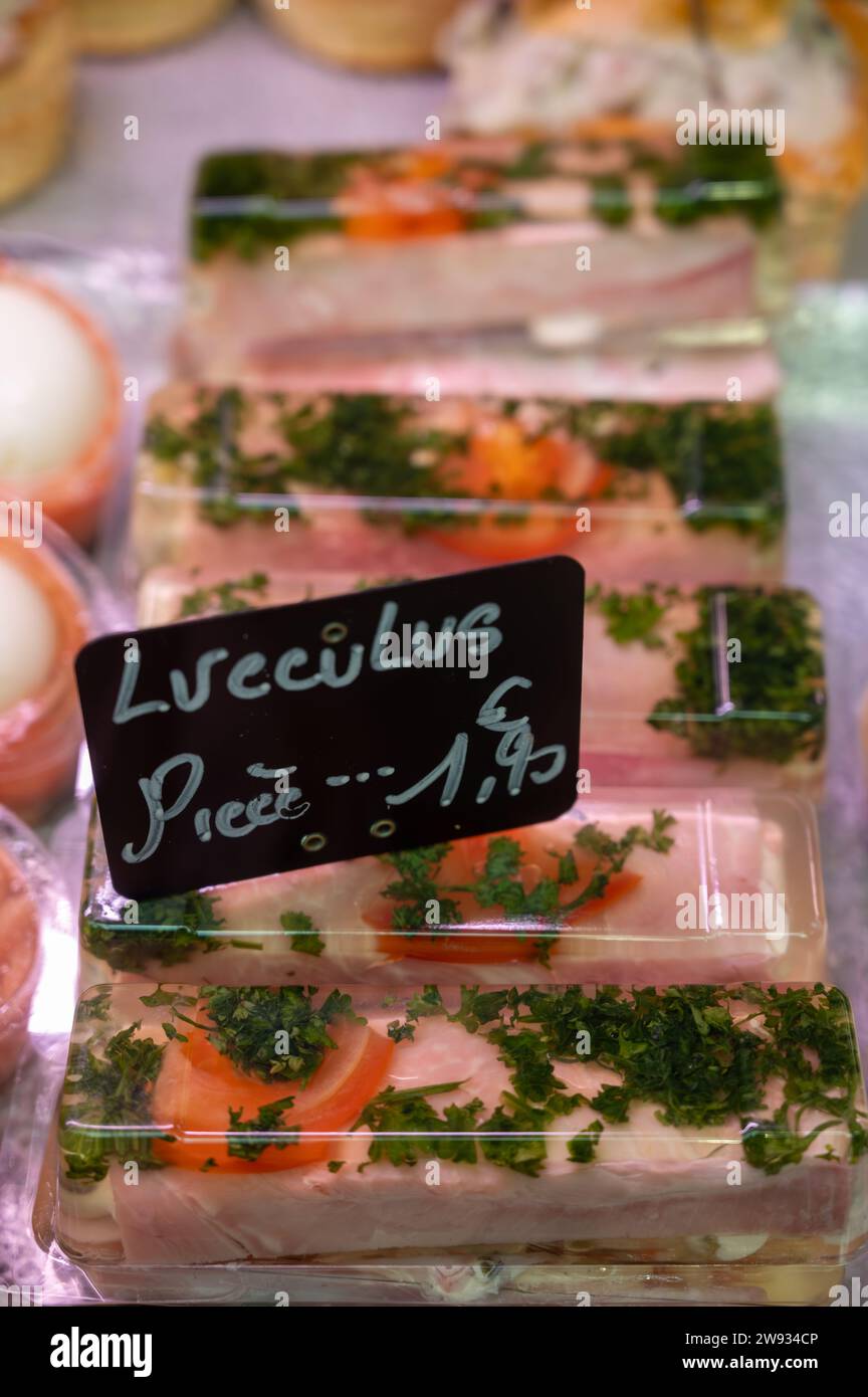 Assortment of meat on weekly food market in France, English translation ...