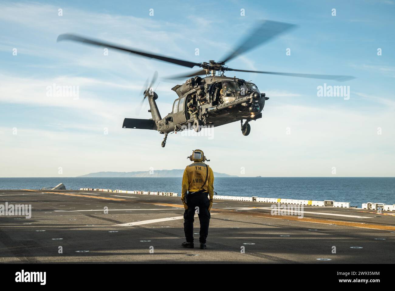 PACIFIC OCEAN (Dec. 10, 2023) - A U.S. Army MH-60M Black Hawk attached ...