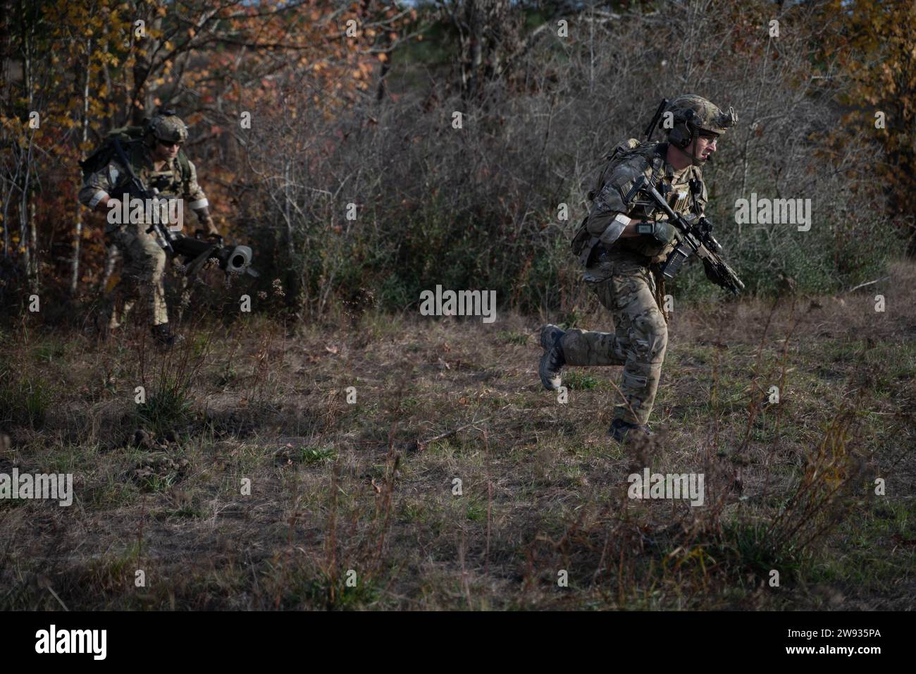 Rangers assigned to the 75th Ranger Regiment assault the objective ...