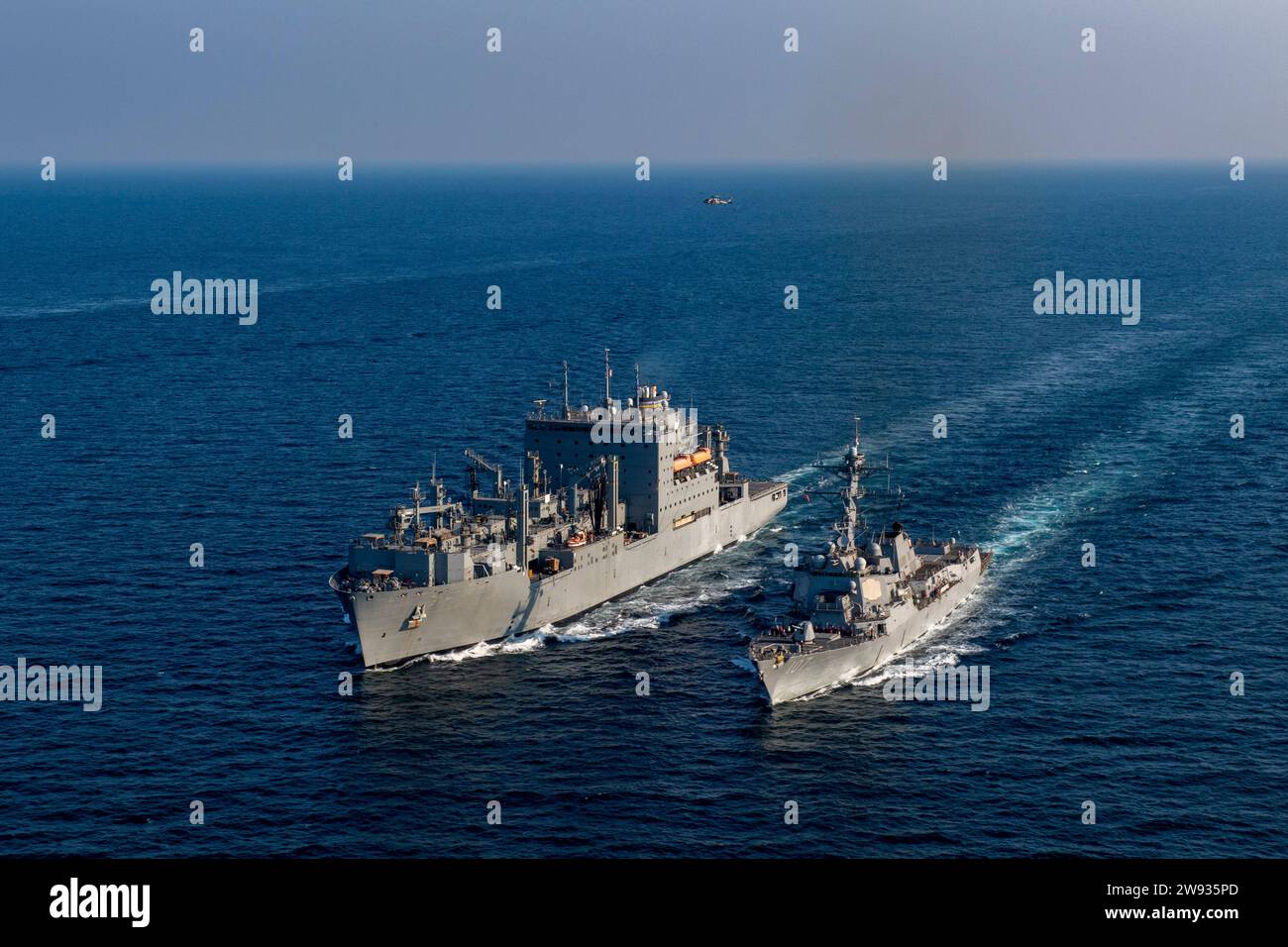 The dry cargo ship USNS Alan Shepard (T-AKE 3), the guided-missile ...