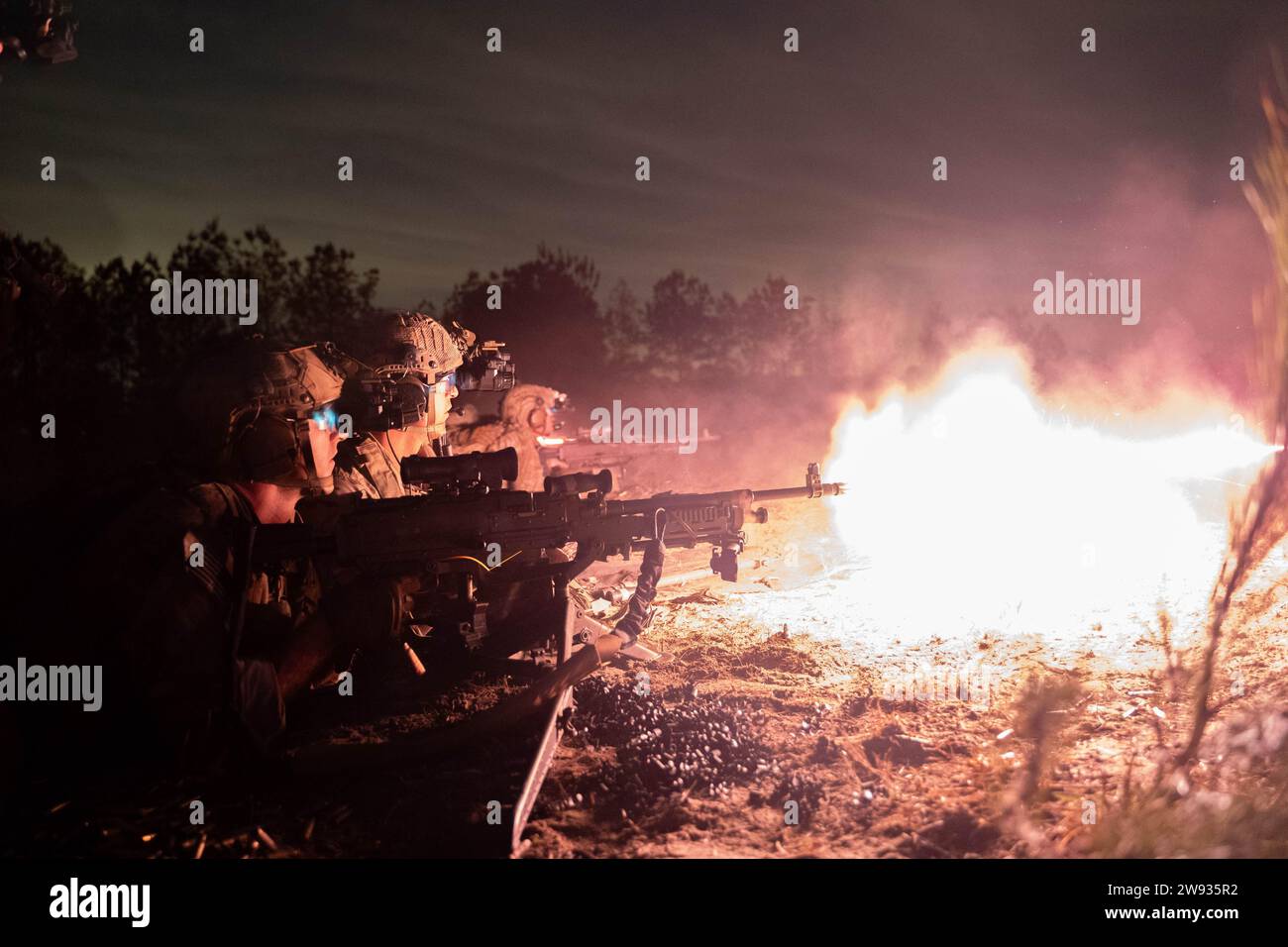 A Ranger fire team assigned to the 75th Ranger Regiment suppresses ...