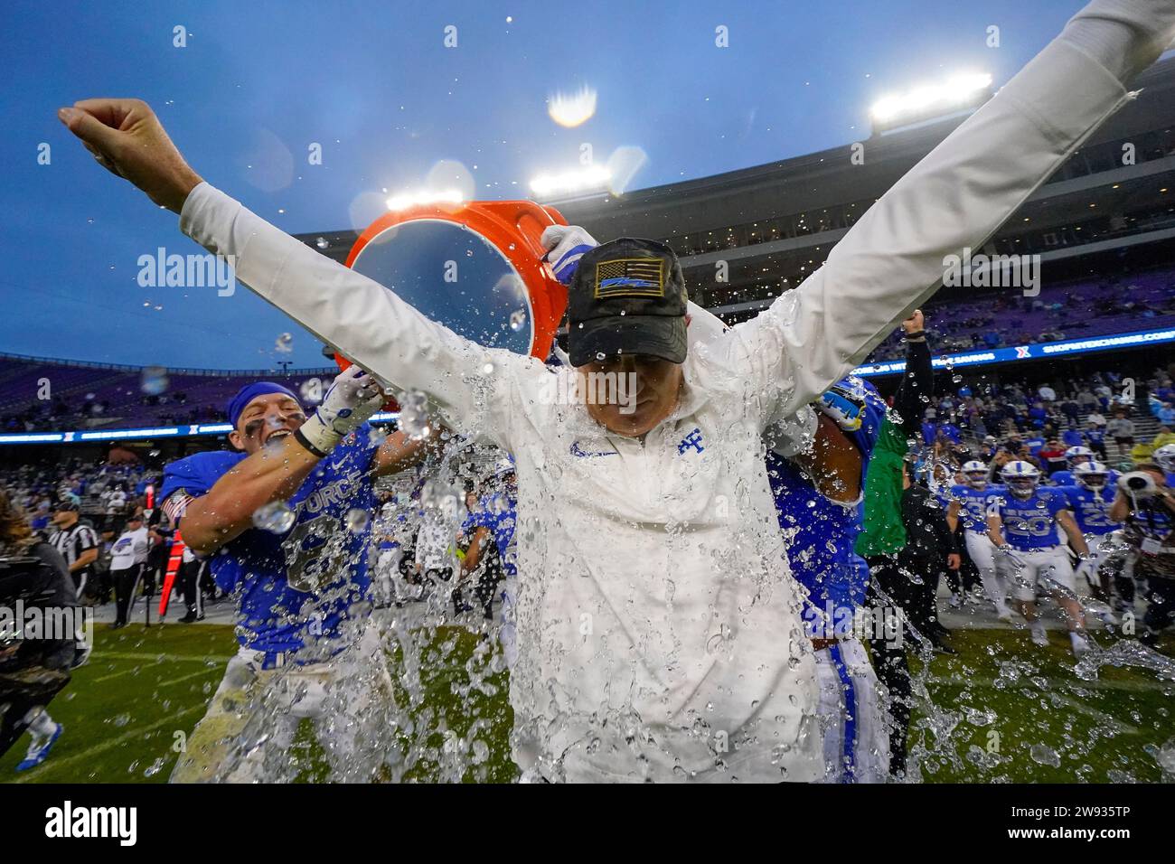 Air Force head coach Troy Calhoun is doused by linebacker Bo Richter ...