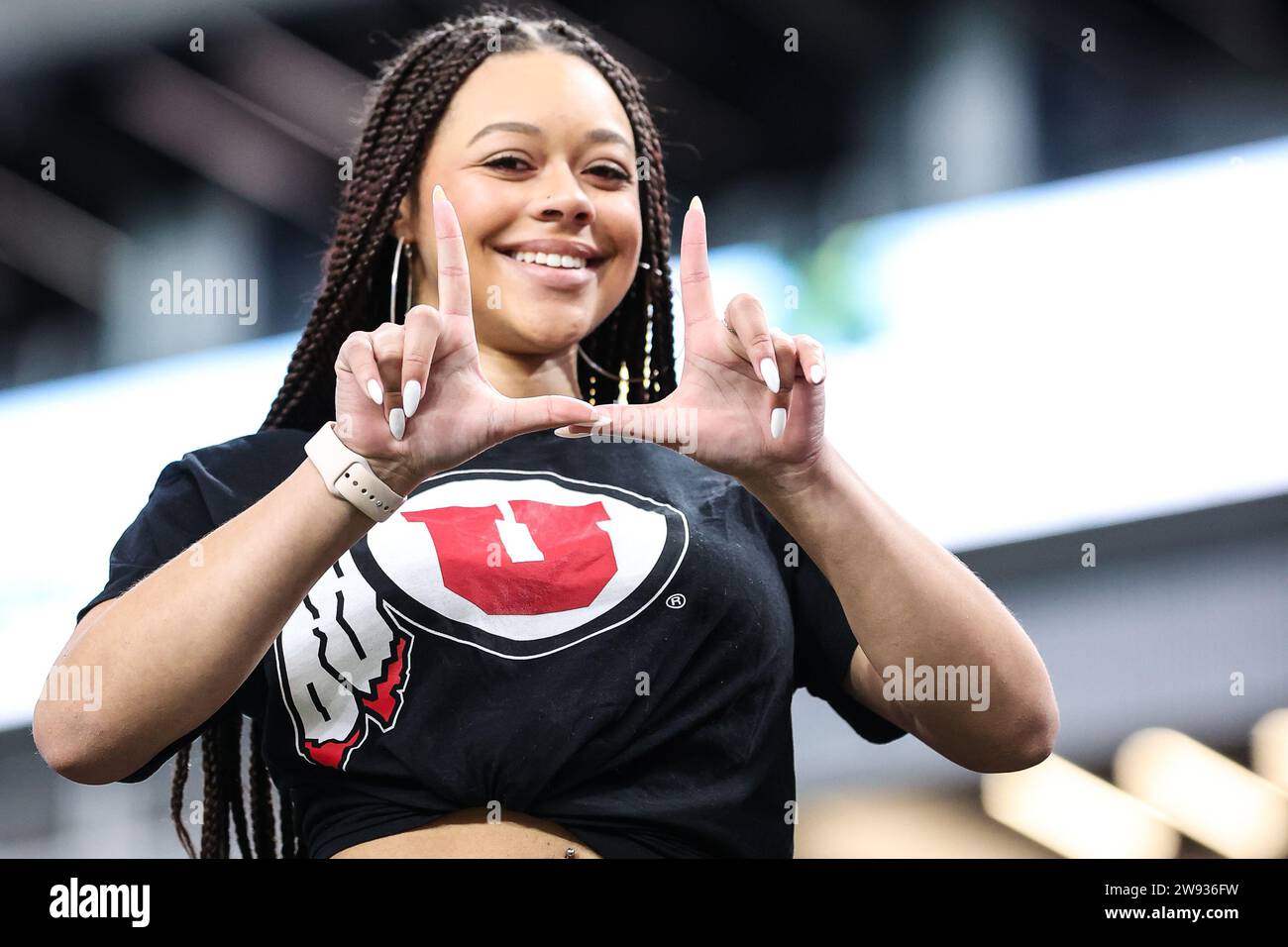 Las Vegas, NV, USA. 23rd Dec, 2023. A Utah Utes fan poses for a photo ...