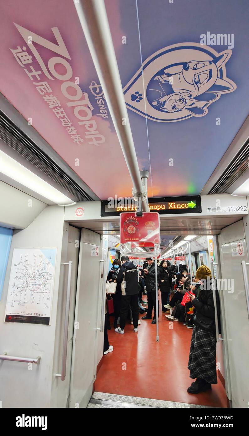 SHANGHAI, CHINA - DECEMBER 21, 2023 - Visitors ride the Disneyland ...
