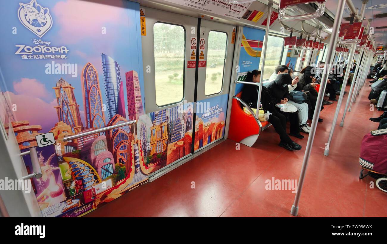 SHANGHAI, CHINA - DECEMBER 21, 2023 - Visitors ride the Disneyland ...