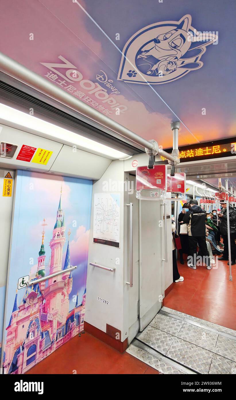 SHANGHAI, CHINA - DECEMBER 21, 2023 - Visitors ride the Disneyland ...