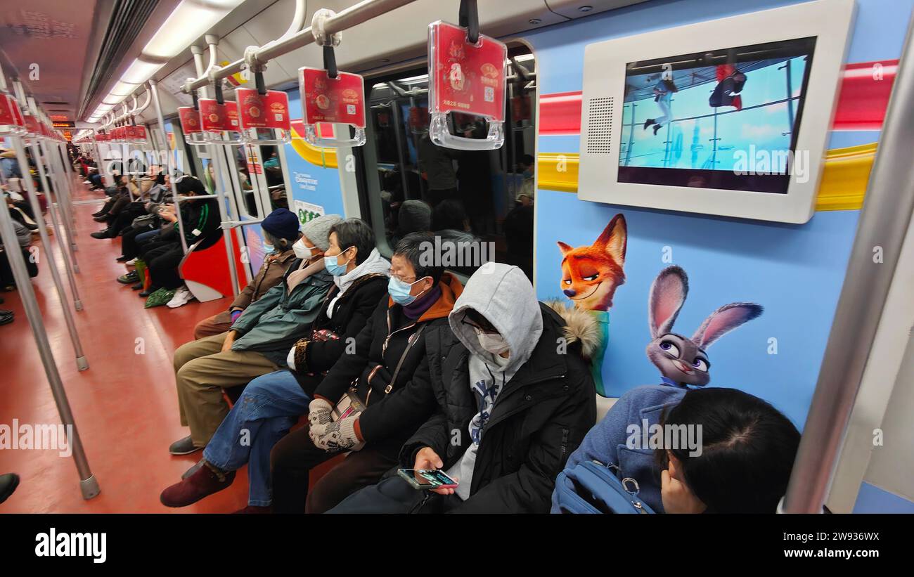 SHANGHAI, CHINA - DECEMBER 21, 2023 - Visitors ride the Disneyland ...