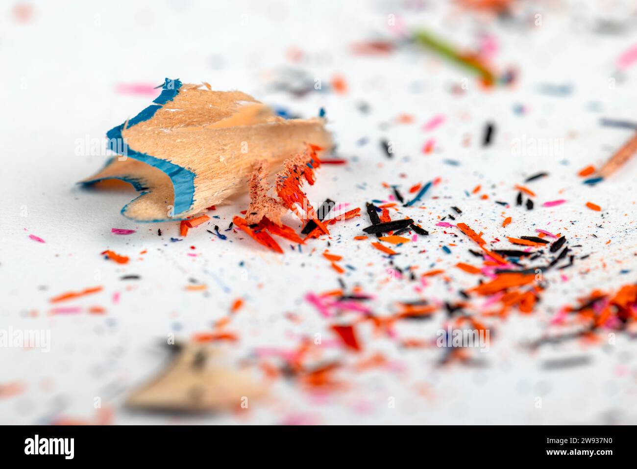 shavings and pieces of lead on paper after sharpening pencils ...