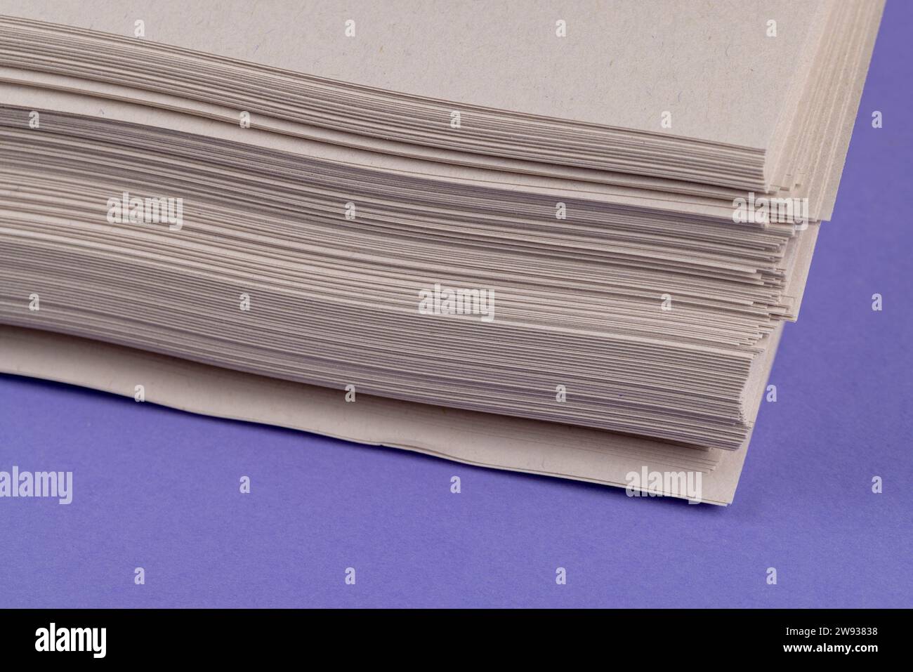 grey low-quality thin paper from recycled waste, paper used for writing ...