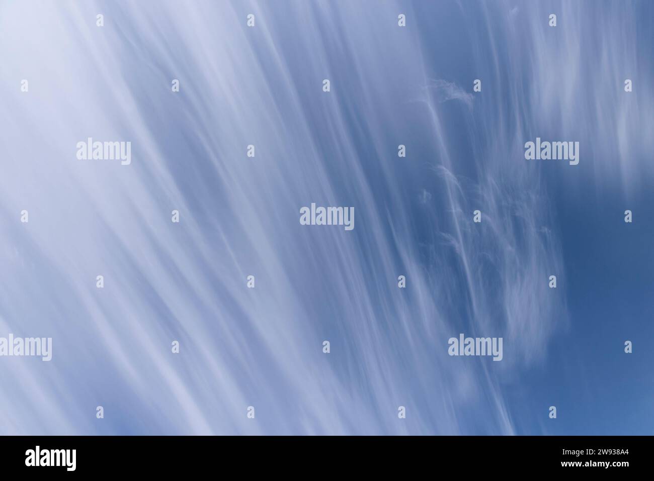 cirrus clouds in the blue sky, beautiful long cirrus clouds in the sky ...