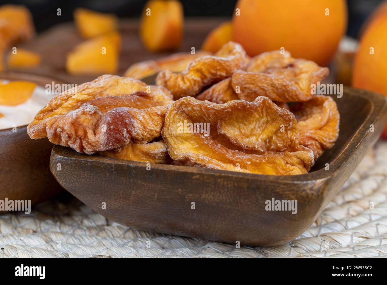 oriental dried fruits unwashed and unpeeled, dried peach before washing ...