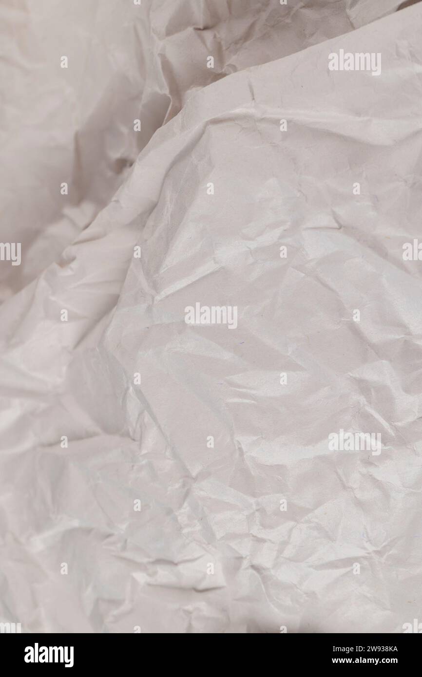 gray low-quality crumpled paper from recycled waste paper , crumpled ...