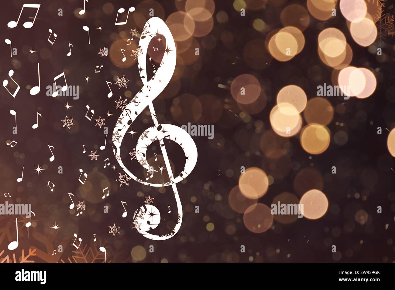 Treble clef, music notes and snowflakes against blurred background ...