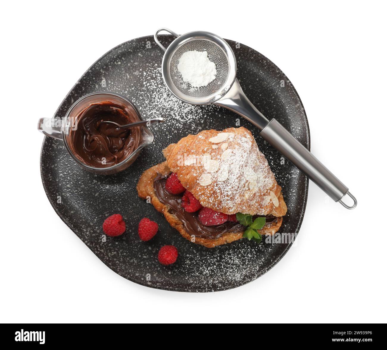 Delicious croissant with raspberries, chocolate and powdered sugar ...
