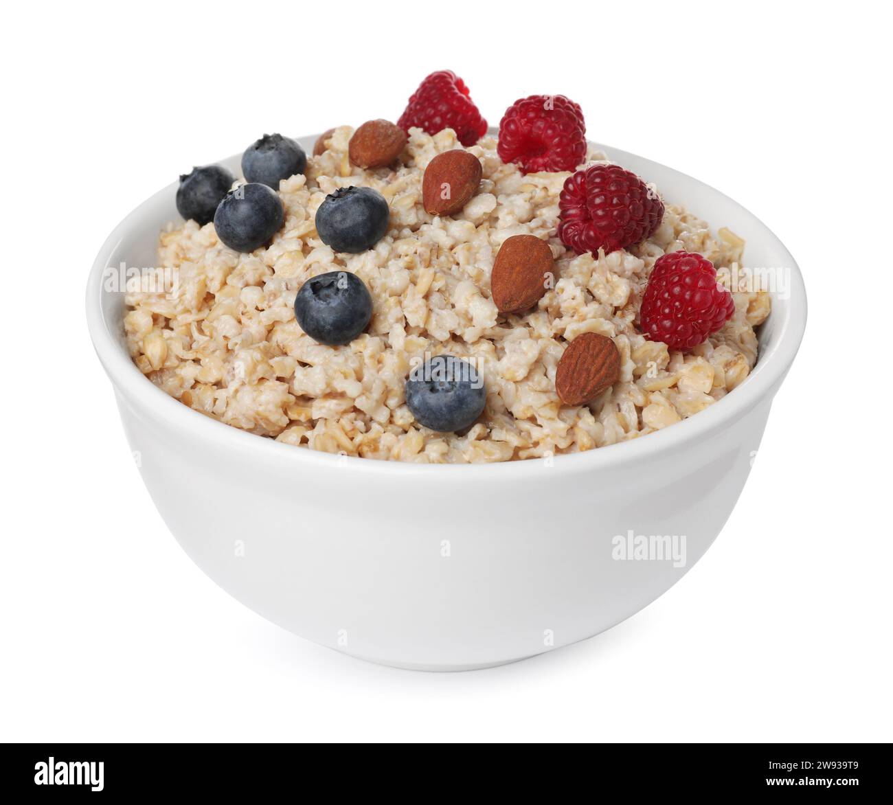 Tasty boiled oatmeal with berries and almonds in bowl isolated on white ...