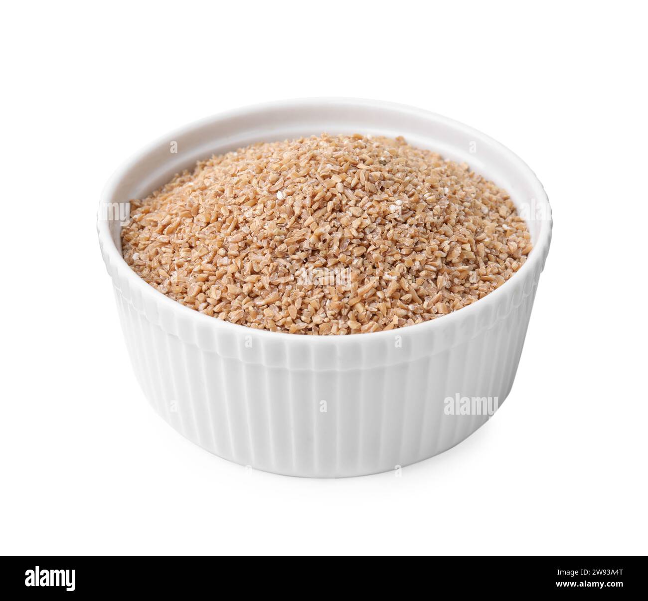 Dry wheat groats in bowl isolated on white Stock Photo - Alamy