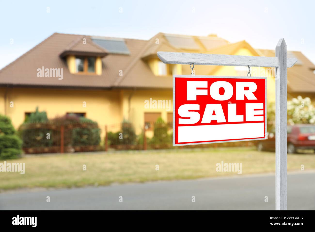 Sale sign near beautiful house outdoors. Red signboard with words Stock ...