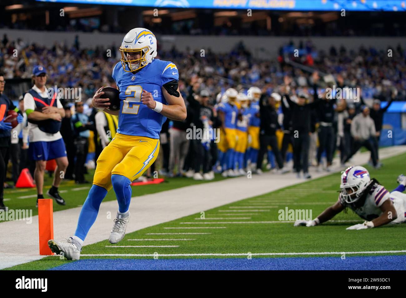 Los Angeles Chargers quarterback Easton Stick (2) scores a rushing ...