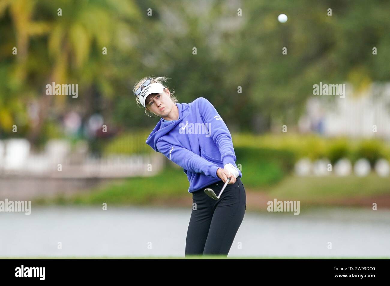 Orlando, Florida, USA. 17th Dec, 2023. Nelly Korda chips onto the 18th ...