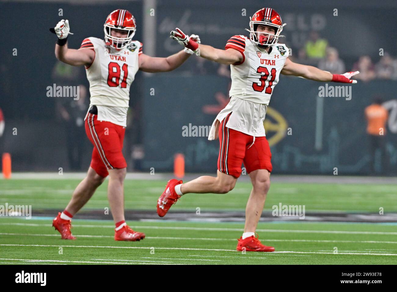 Utah defensive end Connor O'Toole (81) and safety Nate Ritchie (31 ...