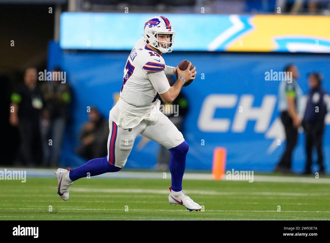 Buffalo Bills quarterback Josh Allen (17) runs down field during the first half of an NFL ...