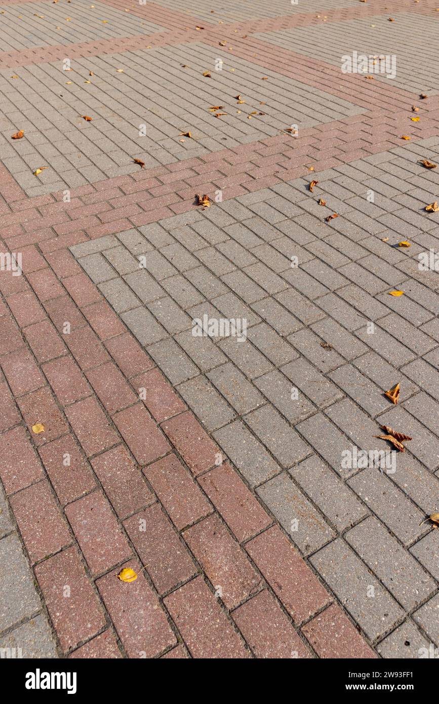 grey and red concrete tiles , paved road with concrete tiles Stock ...