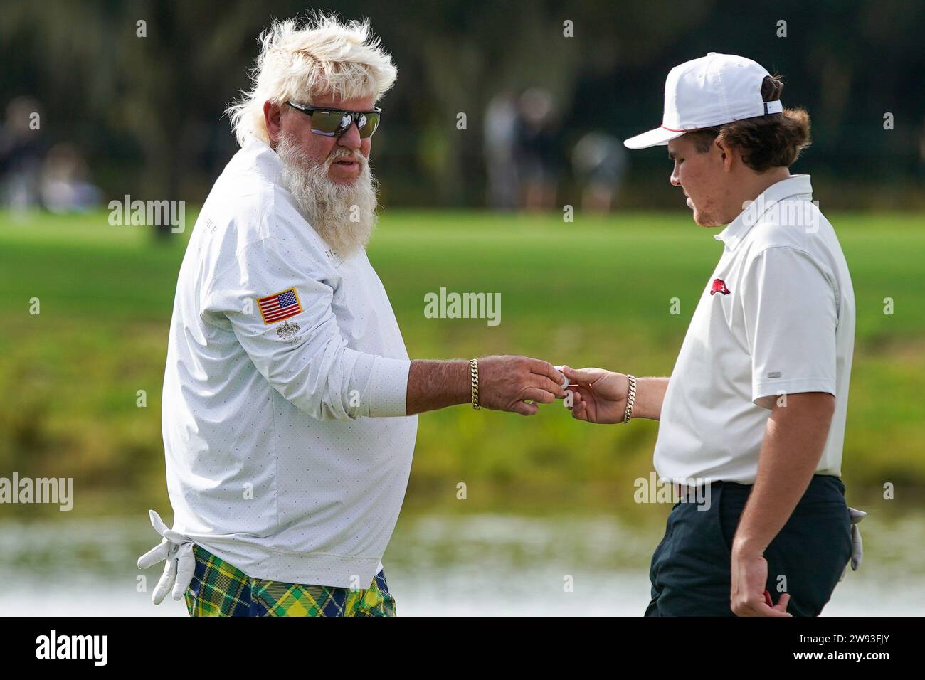 Orlando, Florida, USA. 17th Dec, 2023. John Daly (L) and son, John Daly ...