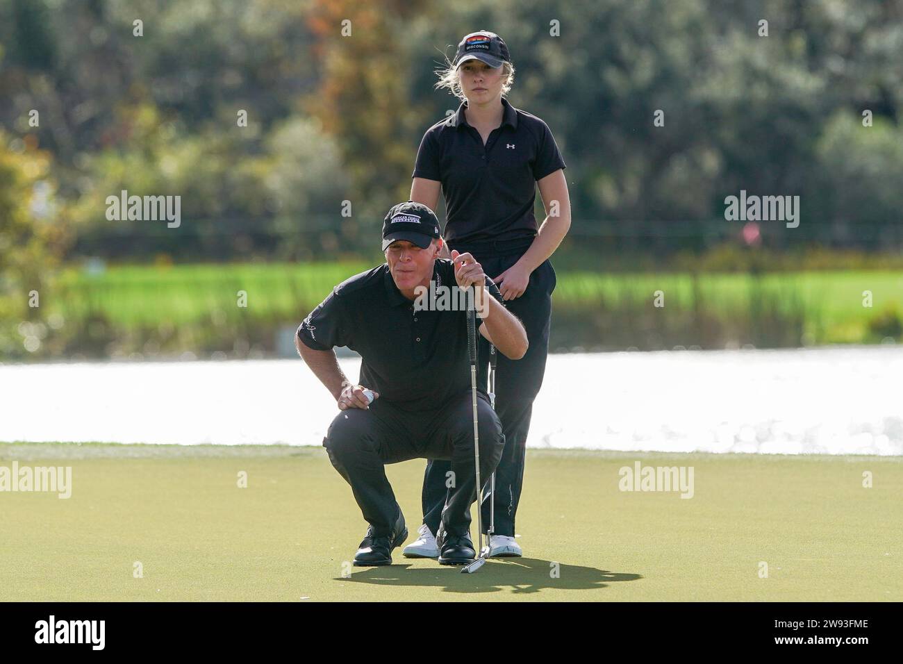 Orlando, Florida, USA. 17th Dec, 2023. Steve Stricker (bottom) and his ...