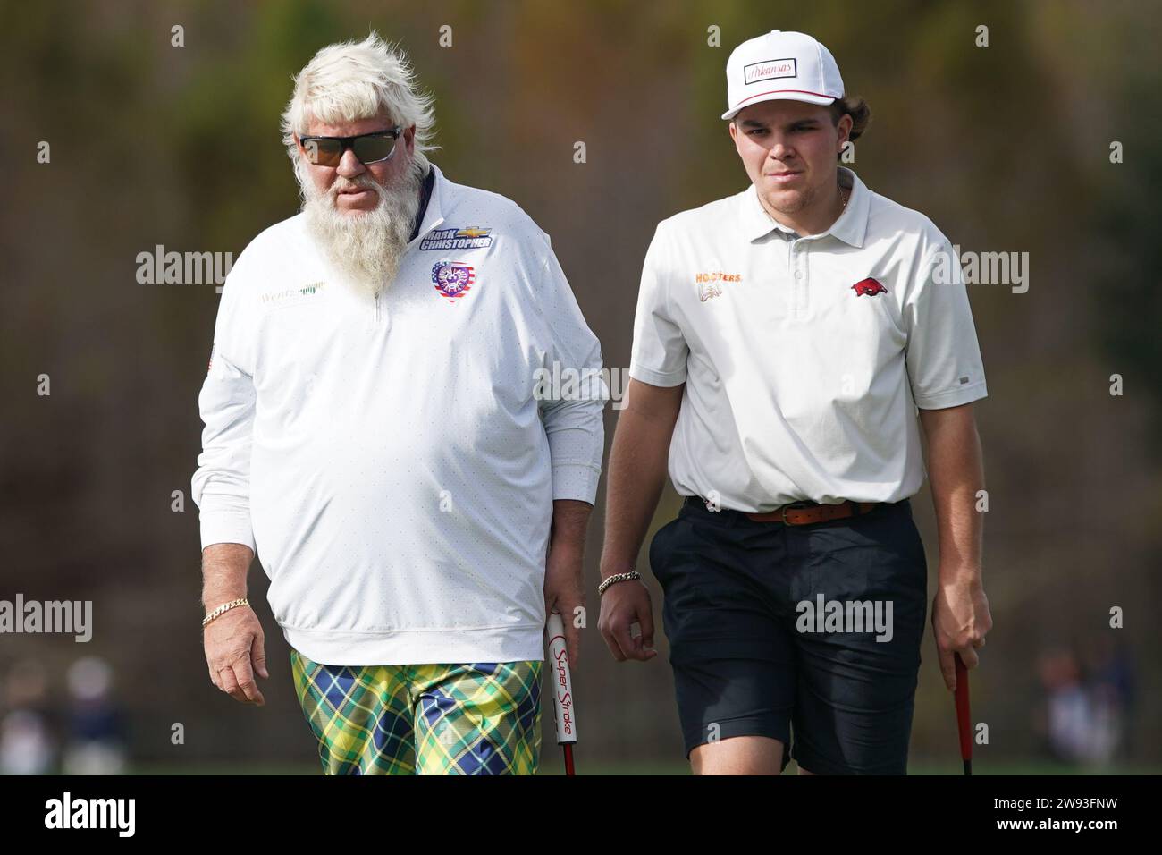 Orlando, Florida, USA. 17th Dec, 2023. John Daly (L) and son, John Daly ...