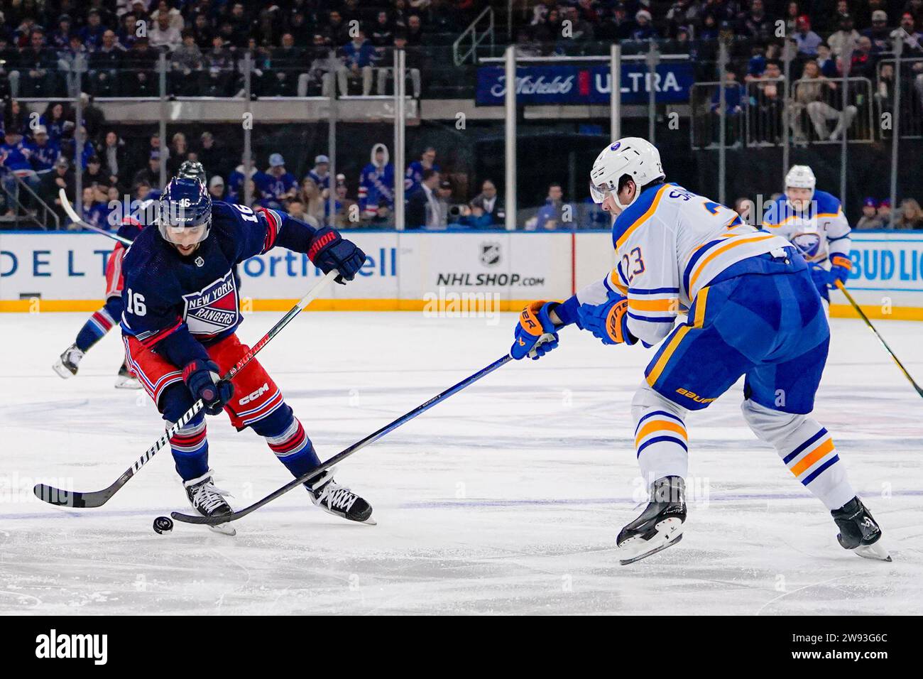 New York Rangers center Vincent Trocheck (16) is defended by Buffalo ...