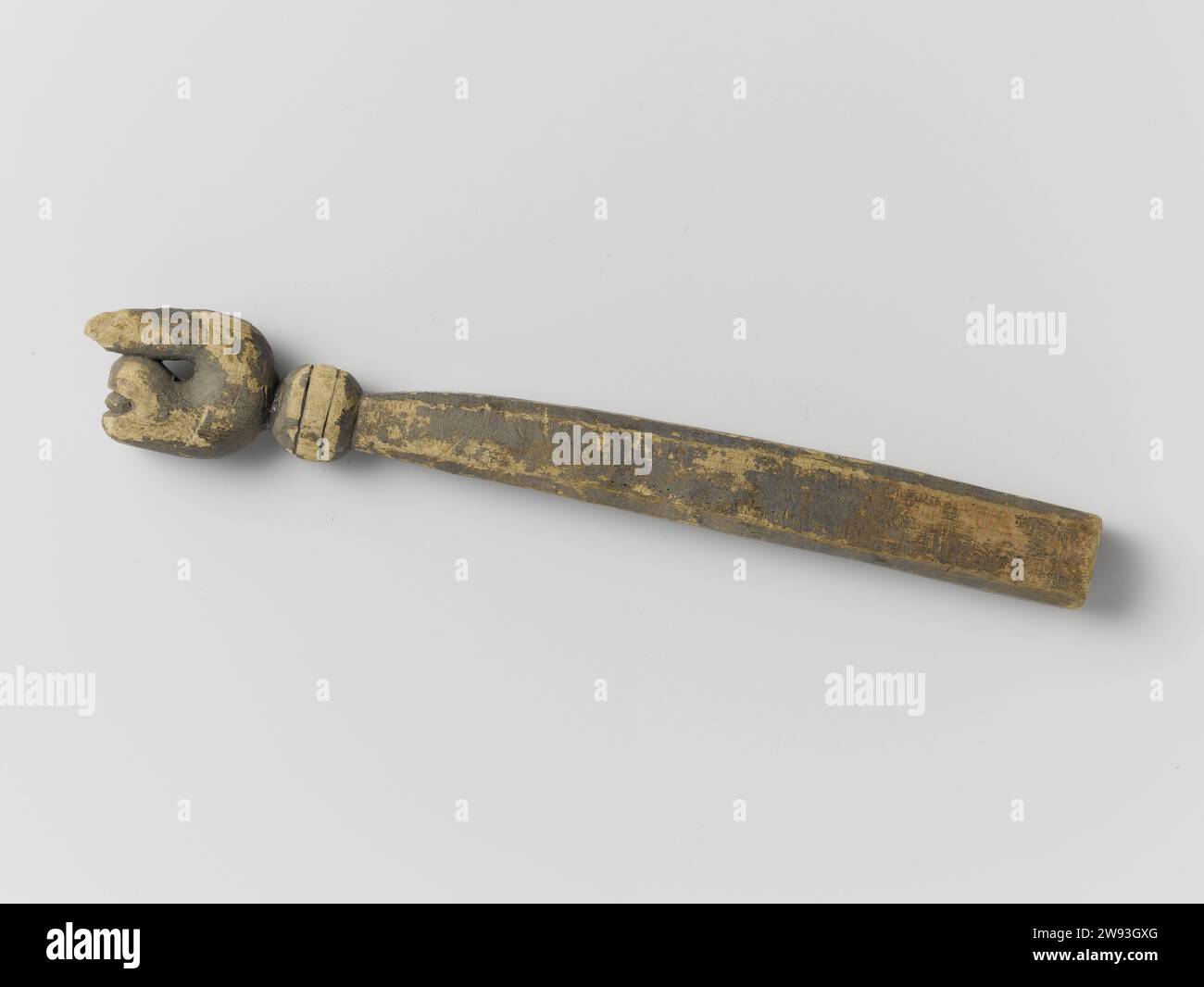Fragment of wood, elongated with round ring and button, anonymous, c ...