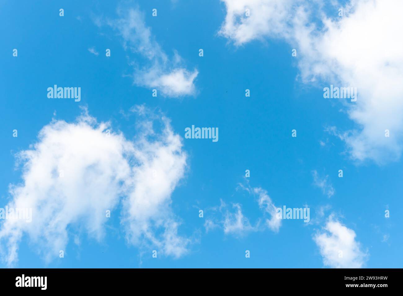 Beautiful blue sky with strange shape of clouds in the morning or ...