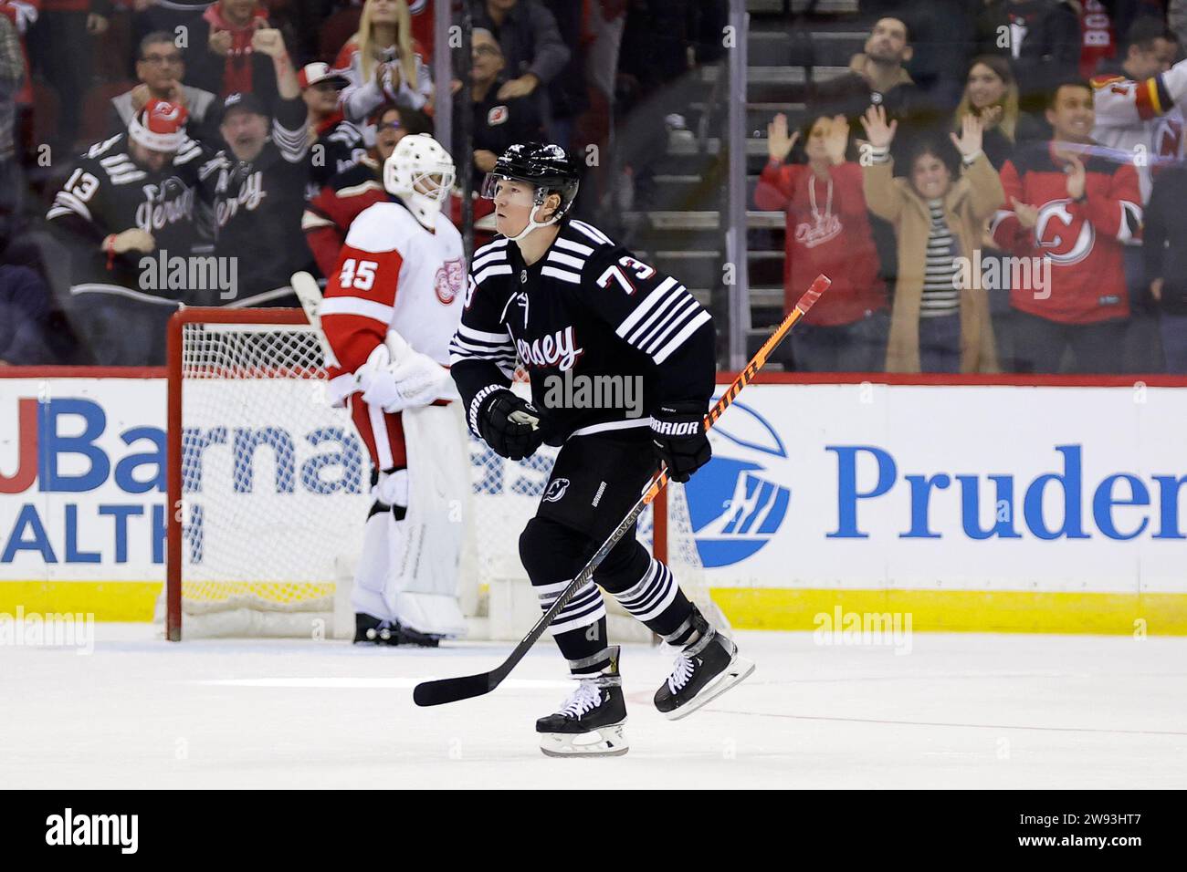 New Jersey Devils right wing Tyler Toffoli (73) skates back to his ...