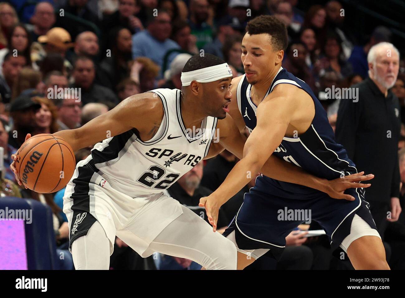 San Antonio Spurs guard Malaki Branham (22) is guarded by Dallas ...
