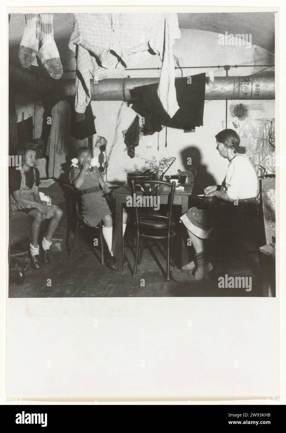 Two children and a woman in an interior, 1945 - 1947 documentary ...