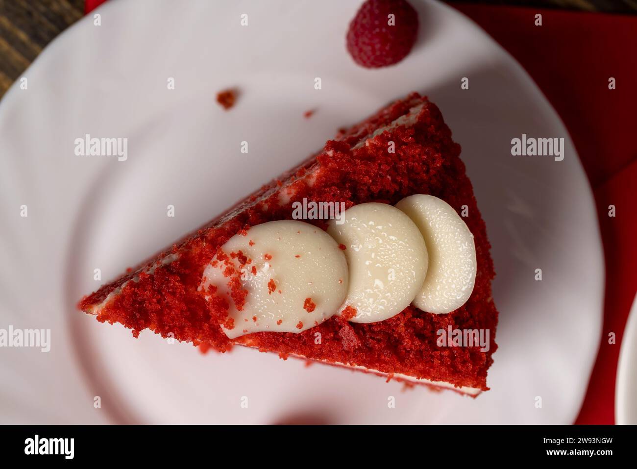 Red cake with cream and raspberry flavor, a piece of sweet dessert red ...