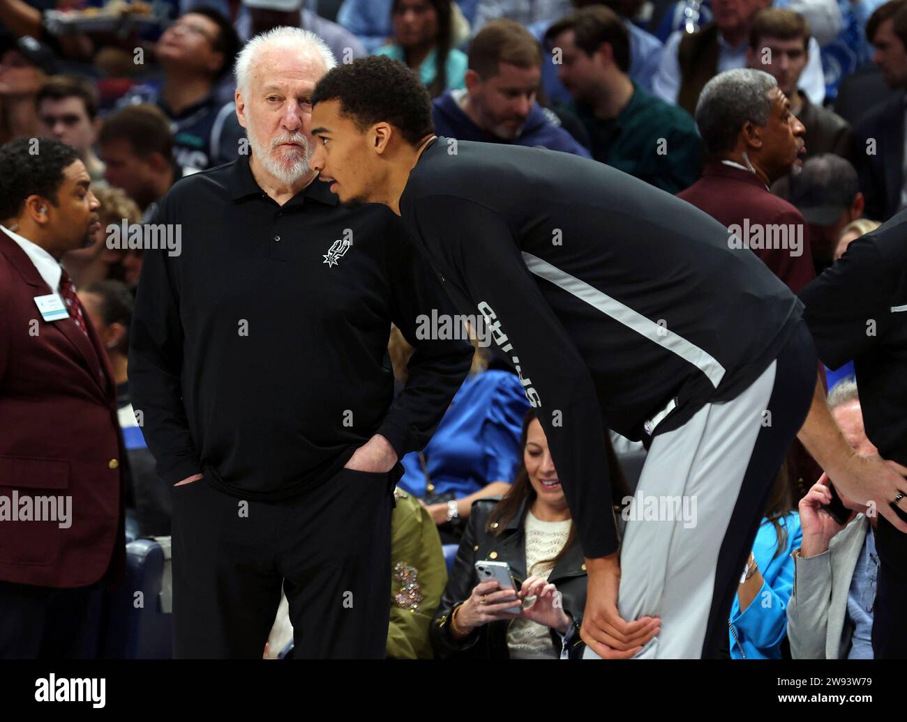 San Antonio Spurs coach Gregg Popovich talks with center Victor ...
